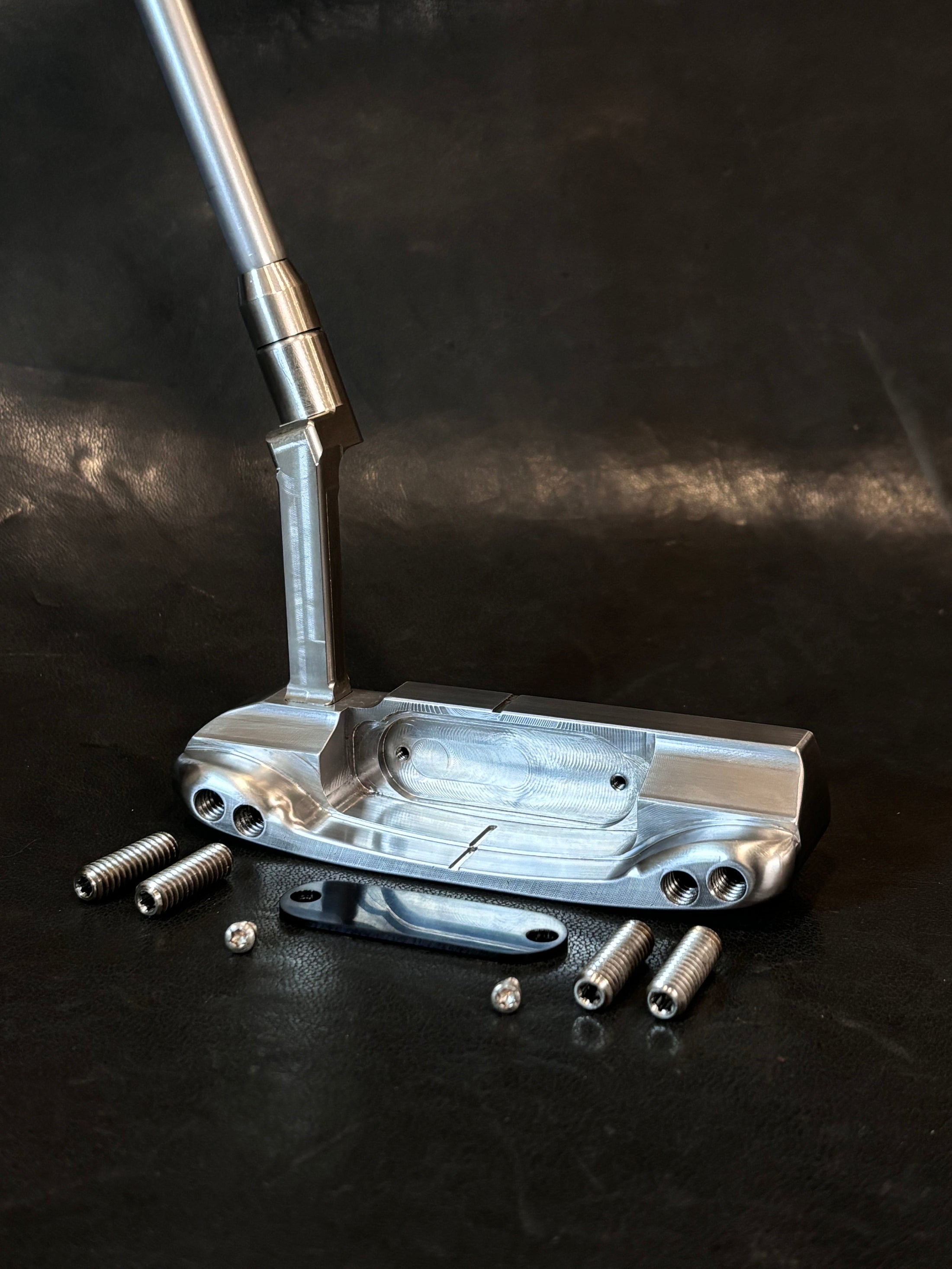 How much should my putter weigh? – Machine Putters