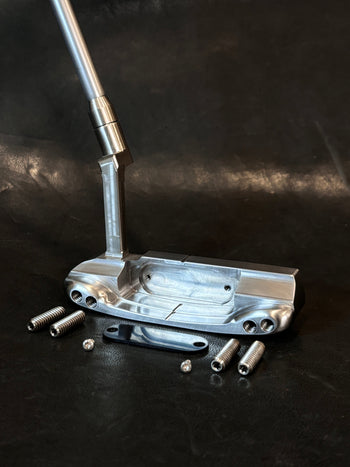 How much should my putter weigh? – Machine Putters